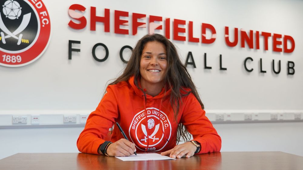 Georgia Robert signs